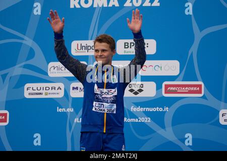Oloksii Sereda of Ukraine celebrates his gold medal on the podium of ...