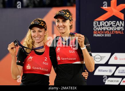 Switzerland's Tanja Huberli and Nina Brunner, front, in action against ...