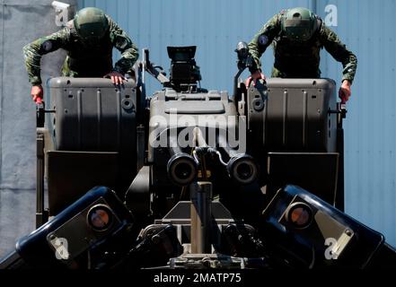 Taiwanese soldiers operate a Oerlikon 35mm twin cannon anti-aircraft ...