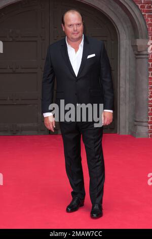 Gavin Spokes poses for photographers upon arrival for the premiere of ...