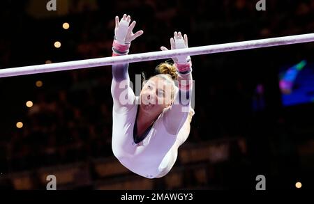 France's Lorette Charpy competes in the women's uneven bars final ...