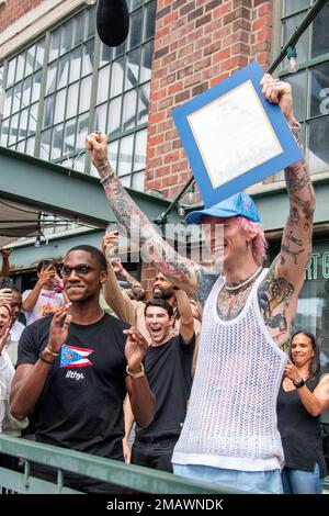 City of Cleveland Mayor Justin M. Bibb, left, and Machine Gun Kelly are ...