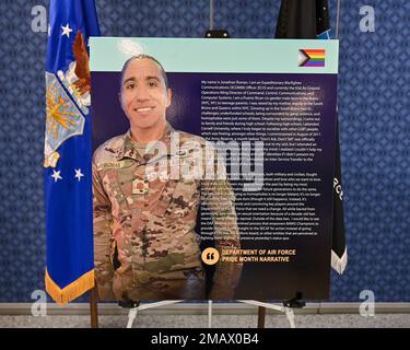 A poster is displayed during a Department of the Air Force Pride ...