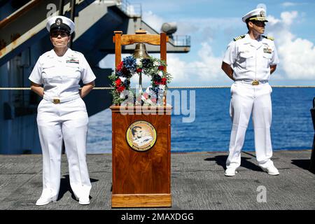 PHILIPPINE SEA (June 7, 2022) Capt. Patrick Baker, middle, executive ...