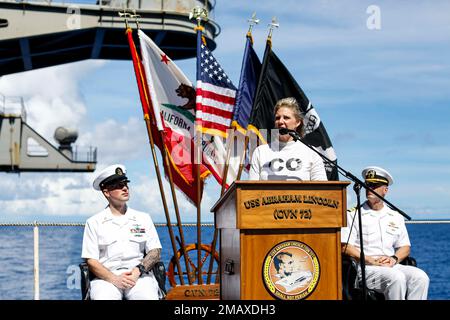 PHILIPPINE SEA (June 7, 2022) Capt. Patrick Baker, middle, executive ...
