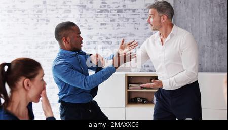 Angry Dominant Colleague Fighting And Bullying At Workplace Stock Photo ...