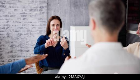 Sign Language Class For People With Disability Stock Photo - Alamy