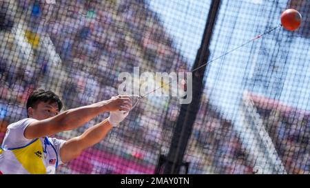 Jackie Wong Siew Cheer of Malaysia competing in the men’s hammer final ...