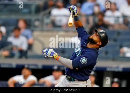 Seattle Mariners' Carlos Santana (41) bats against the Detroit Tigers ...