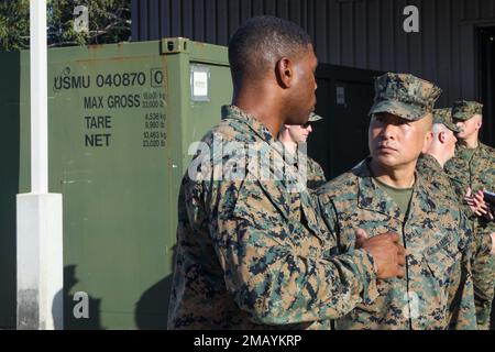 Sgt. Maj. Peter A. Siaw, right, accepts the non-commissioned officer’s ...
