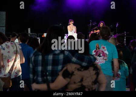 Daya, a singer with the Armed Forces Entertainment, performs for a live ...