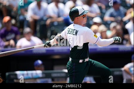 Colorado Rockies' Brian Serven follows the flight of his solo home run ...
