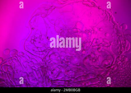 Top view movement of oil bubbles in the liquid. Oil surface ...