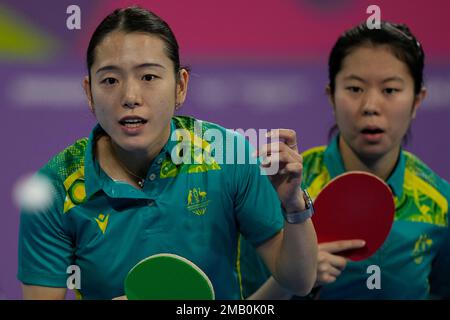 Australia's Minhyung Jee, left, and Yangzi Liu compete against Malaysia ...