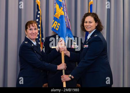 Col. Tracy Allen, left, 436th Medical Group commander, passes the ...