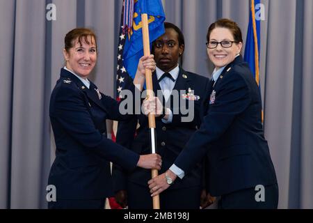 Col. Tracy Allen, left, 436th Medical Group commander, passes the ...