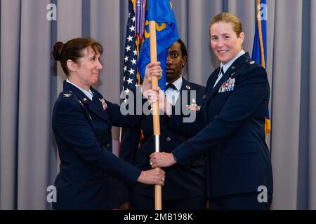Col. Tracy Allen, left, 436th Medical Group commander, passes the ...