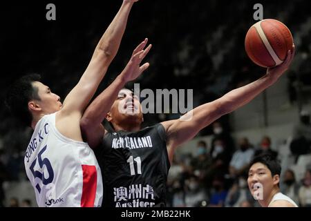 New Zealand's Flynn Cameron, right plays against Jordan's Amin Abu ...