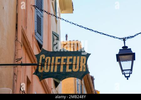 Coiffeur french text sign of classic vintage hairdresser shop in the ...