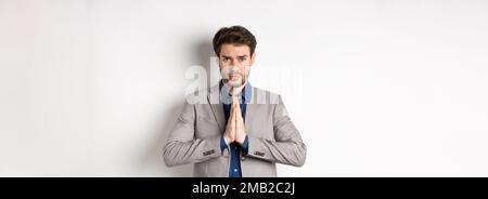 Sad cute business man need help, say please or sorry, showing begging ...