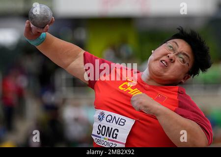 Jiayuan Song, of China, competes during the women's shot put final at ...