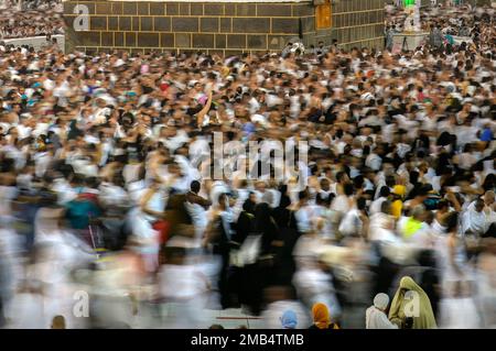 In this photo taken with low shutter speed, Muslim pilgrims ...
