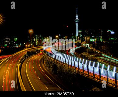 light trails and cityscape with empty road floor Stock Photo - Alamy