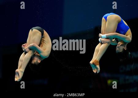 Zhu Zifeng and Lin Shan of China compete during the mixed diving ...