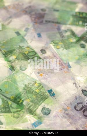Blurred photo of one hundred and five hundred euros are defrosted in ...