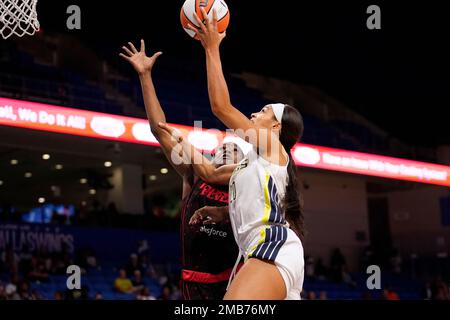Dallas Wings forward Isabelle Harrison takes a shot during a WNBA ...