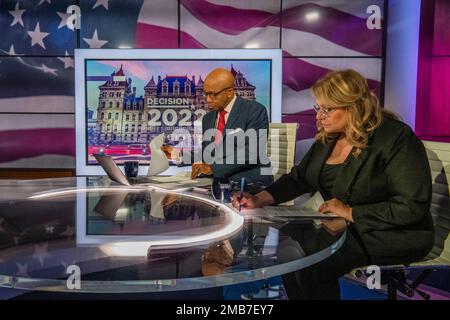 From left, political anchors Errol Louis and Susan Arbetter during New ...