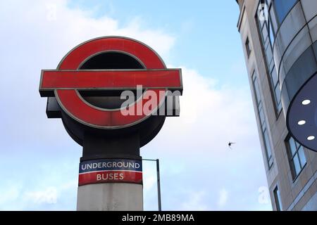 Bus stop sign outside Fulham Broadway in the borough of Hammersmith and ...