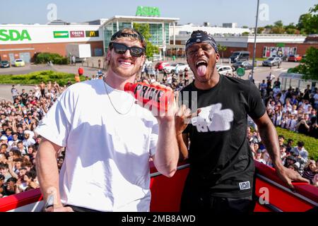 Logan Paul, left, and KSI, pose for photographers as they promote an ...