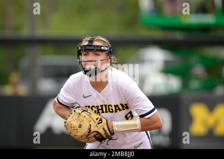 Michigan pitcher Alex Storako (8) throws from the mound during an NCAA ...