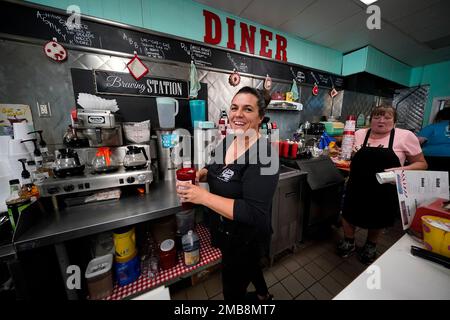 Tiffany Hollis, center, owner of the Dashing Diner, in Johnstown, Ohio ...