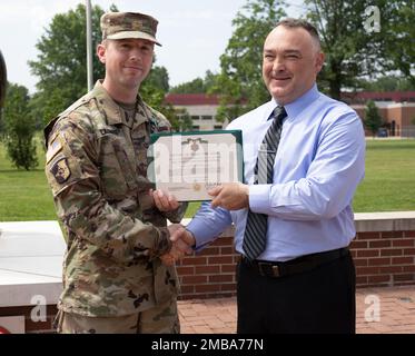 Dr. Steven Dewey (left), deputy support operations officer, 1st Theater ...