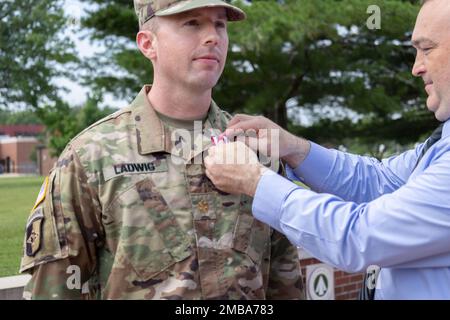 Maj. Timothy Ladwig (left), plans officer in charge, 1st Theater ...