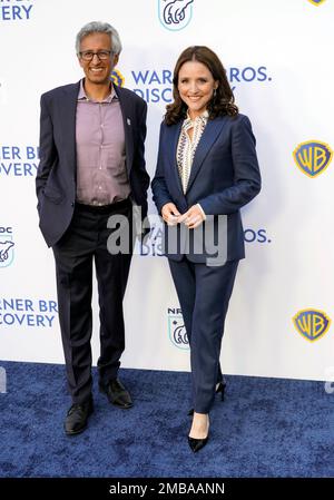 Manish Bapna and Julia Louis-Dreyfus walking on the red carpet at the ...