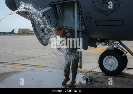 Col. Benjamin R. Jonsson, the 6th Air Refueling Wing commander, pins a ...