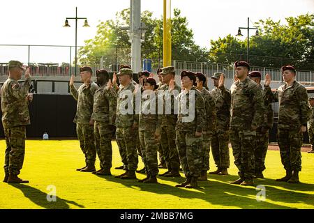 Soldiers from across the XVIII Airborne Corps take an oath of ...