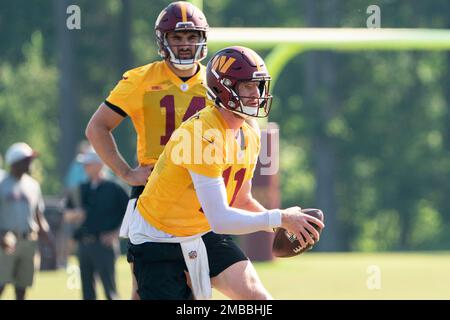 Washington Commanders quarterback Carson Wentz (11) looks on during ...