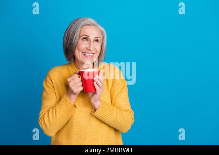 Photo of funny dreamy lady wear striped sweater holding bank card ...