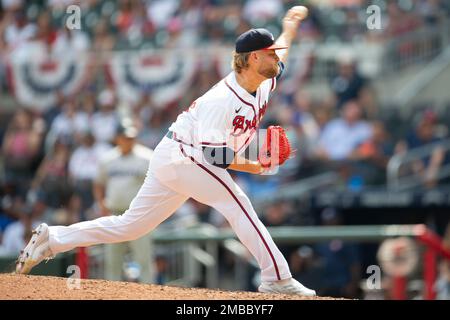 Atlanta Braves relief pitcher A.J. Minter, right, celebrates with ...