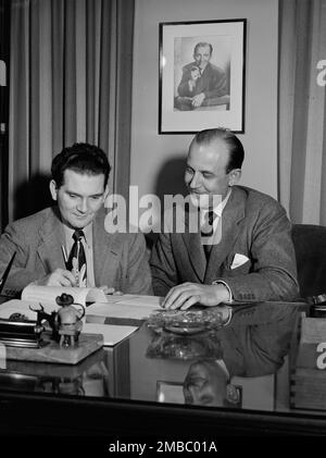Portrait of Joe Mooney, Milt Gabler, and Morty Palitz, Decca studio ...