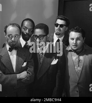 Portrait of serious african american player holding basketball with ...