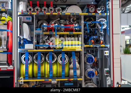 Fire fighting equipment in compartments of a fire truck Stock Photo - Alamy