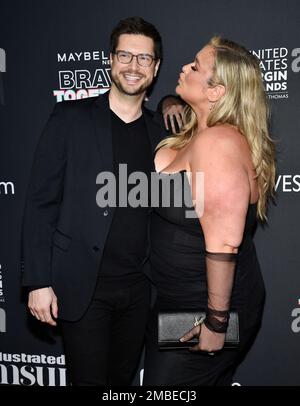 Model Hunter McGrady, right, and husband Brian Keys attend the Sports ...