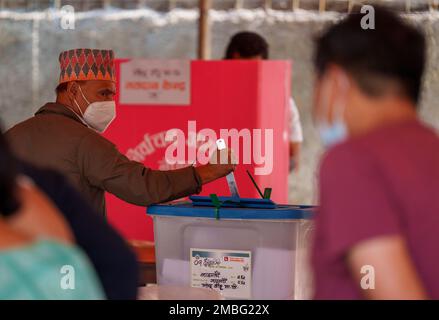 Election in Nepal: ballot box with voicing paper isolated on white ...