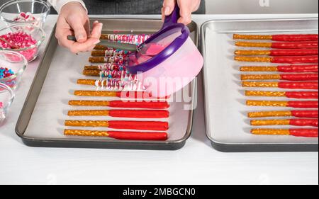 Valentine's Day Chocolate Covered Pretzel Rods Stock Photo - Alamy