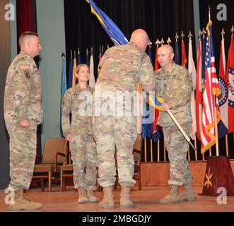 Col. John Popiak, Cyber Protection Brigade commander, passes the guidon ...